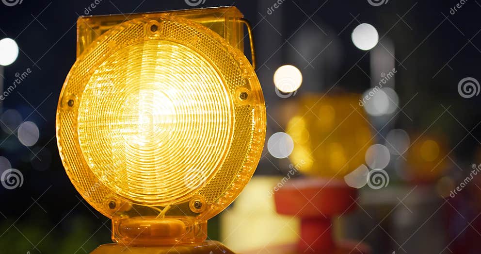 Yellow caution light stock image. Image of barricade - 190093309