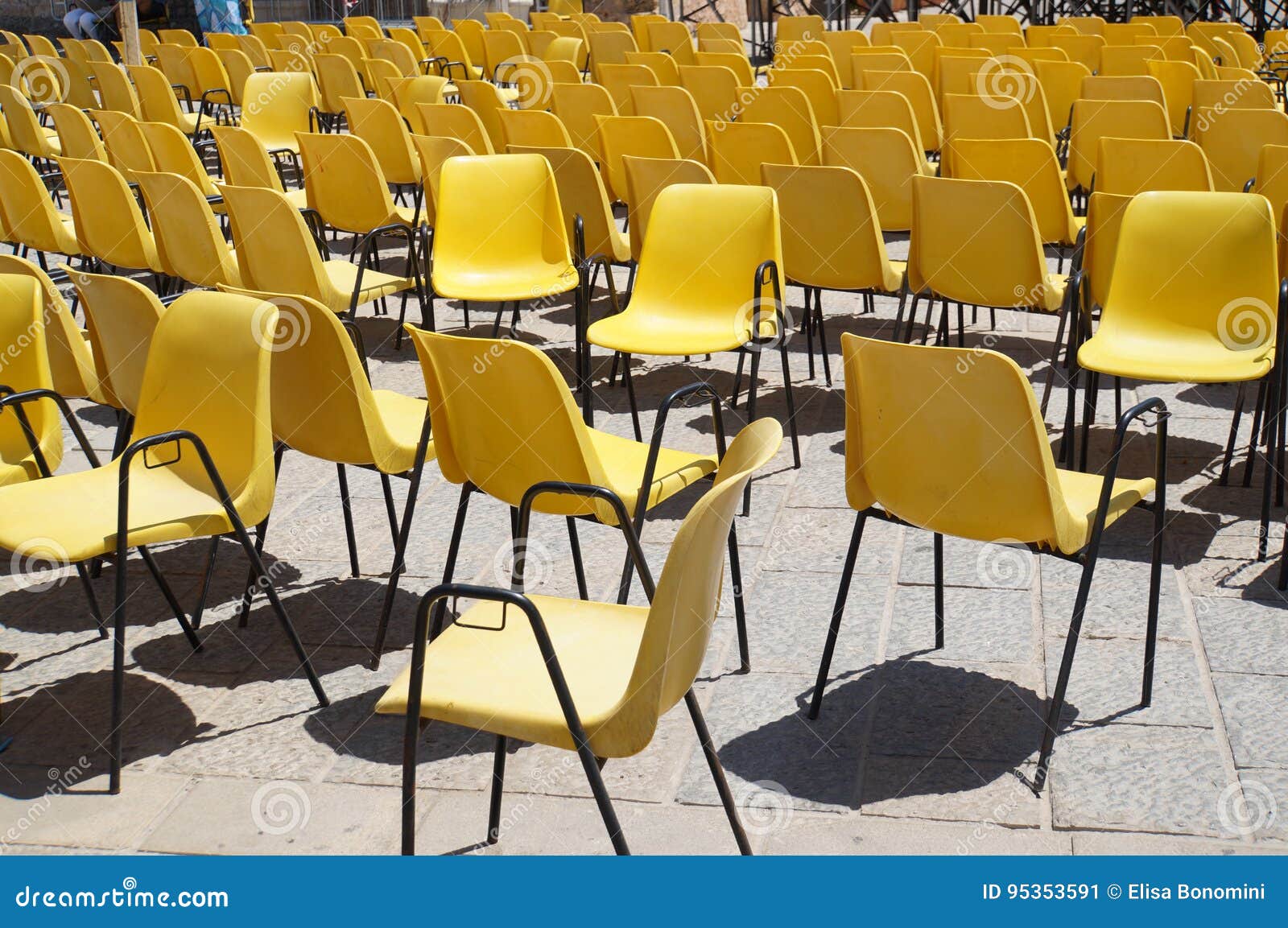 Yellow chairs parade stock image. Image of colorful, seat - 95353591