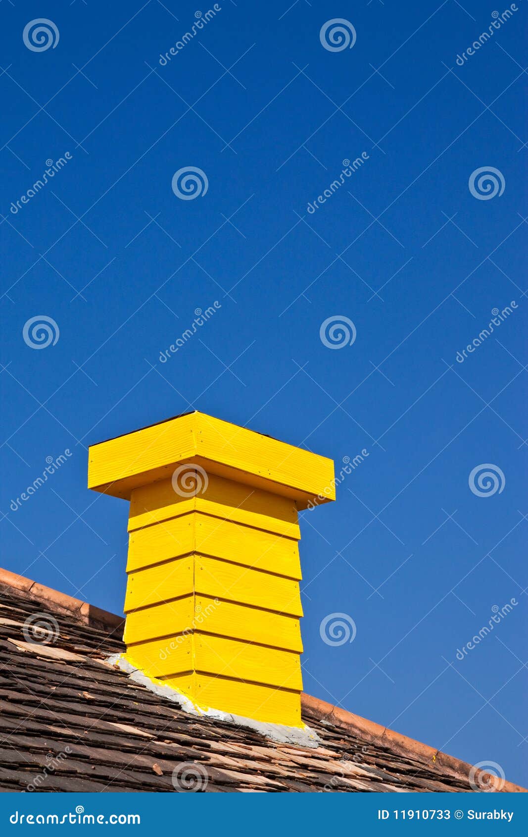Yellow Chimney and Blue Sky Stock Image - Image of roof, yellow: 11910733