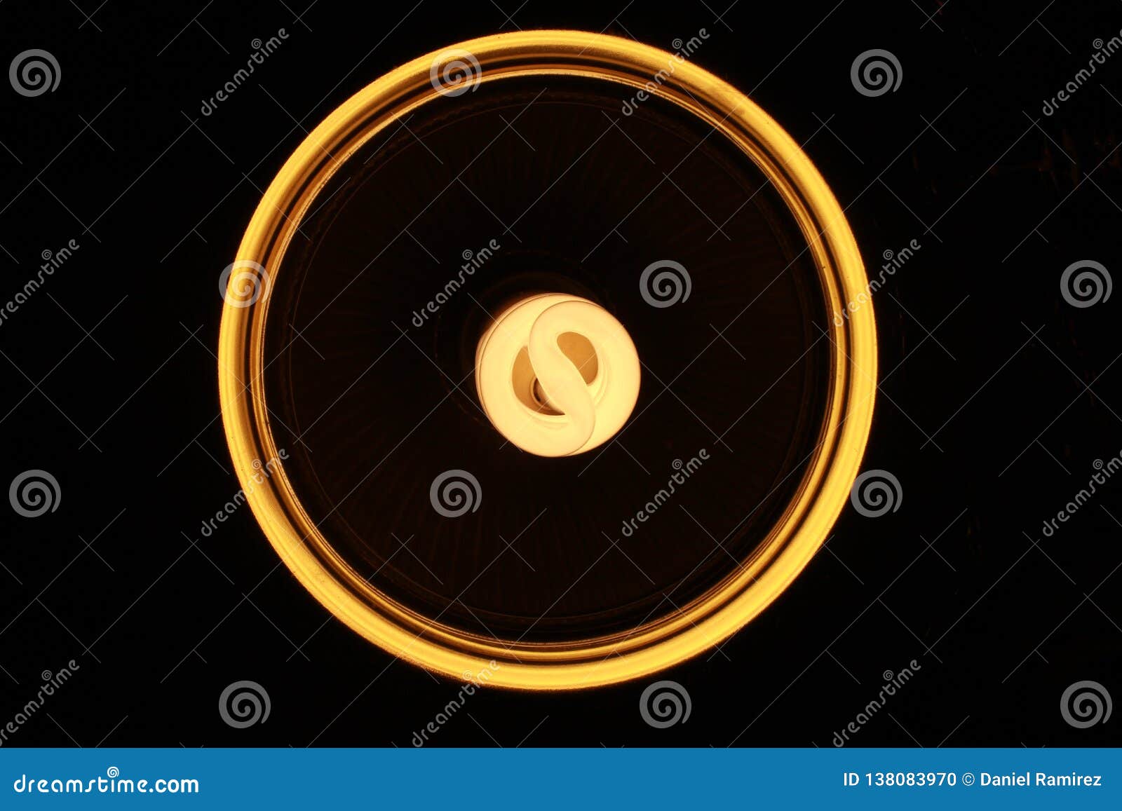 Yellow Circular Coil Lightbulb Stock Photo - Image of branch, bolts ...