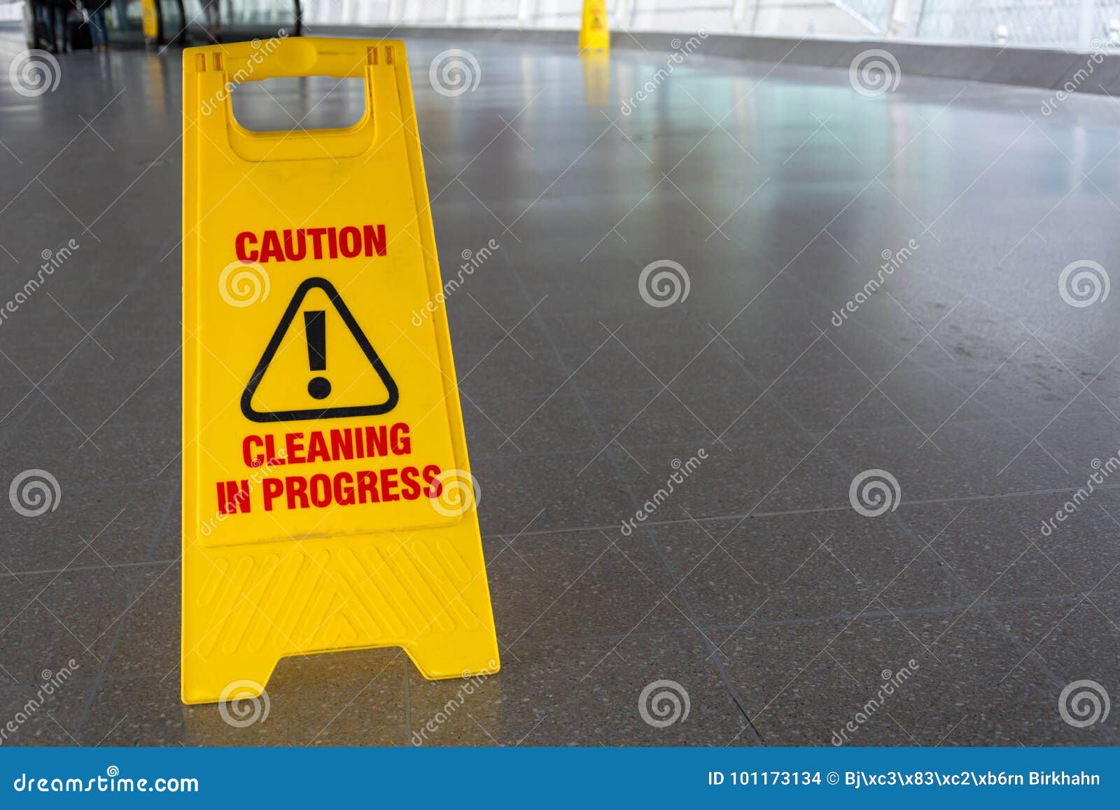 Yellow Cleaning in Process Sign on the Floor Stock Photo - Image of ...