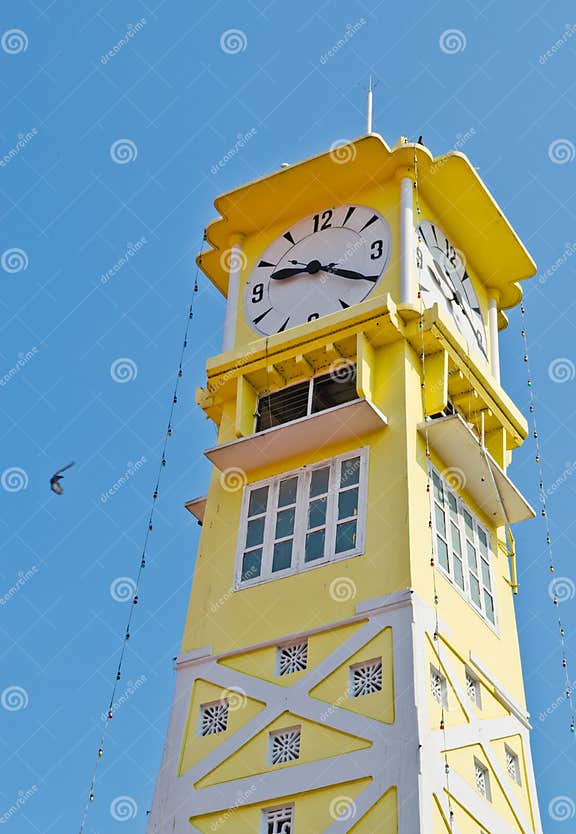 Yellow Clock Tower with Blue Sky Stock Photo - Image of history ...