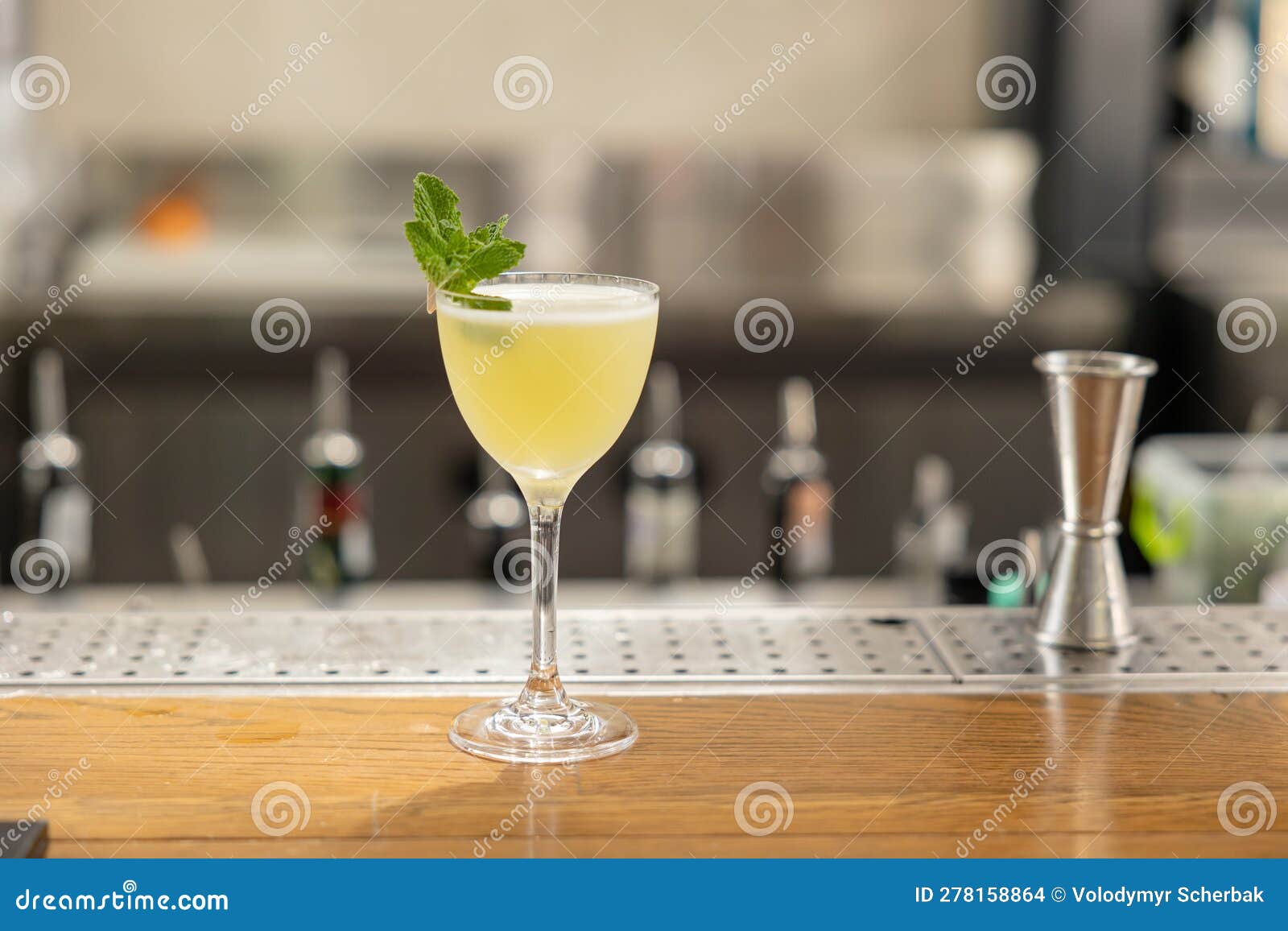 Yellow Cocktail with Mint on the Bar Stock Photo - Image of mango ...