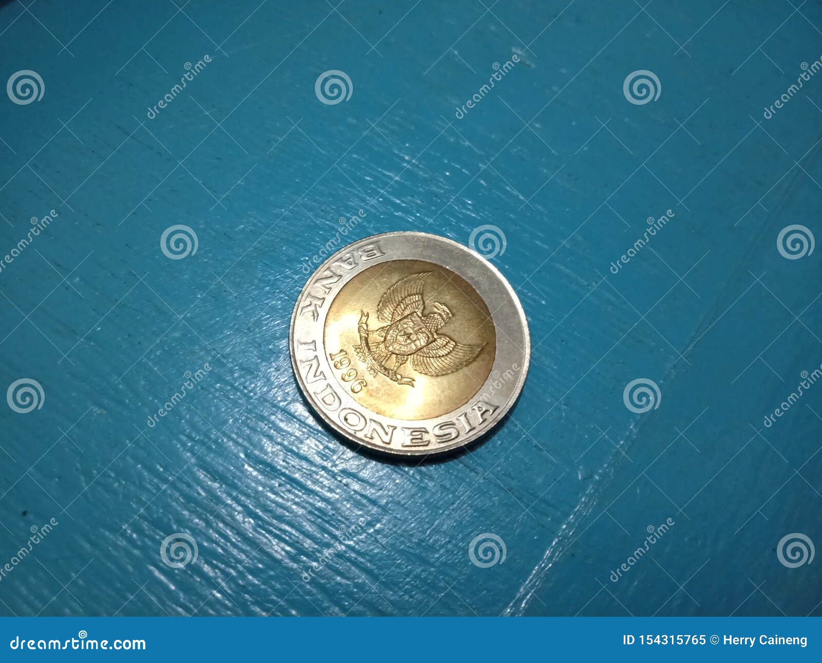 Yellow Coin Rupiah from Indoneia on Top View in 1992 Year Stock Image ...