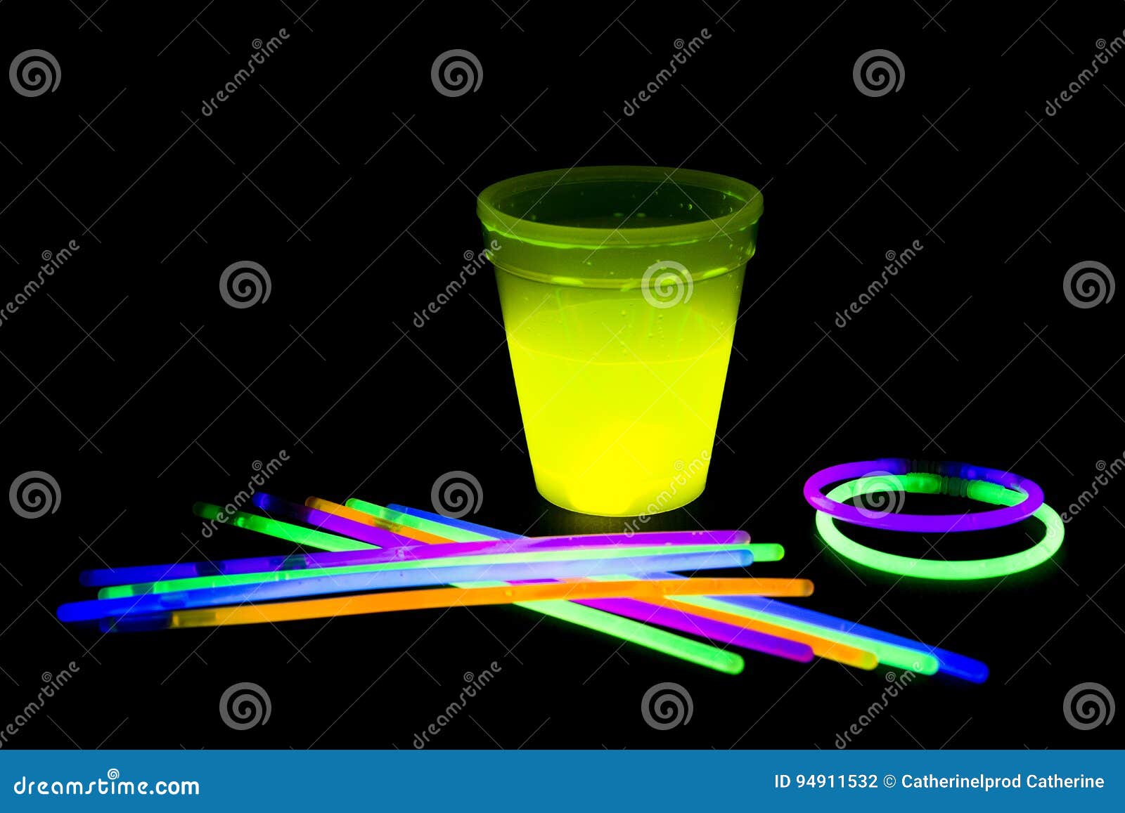 Yellow Colored Fluorescent Glass with Glow Sticks Lights Stock Photo ...