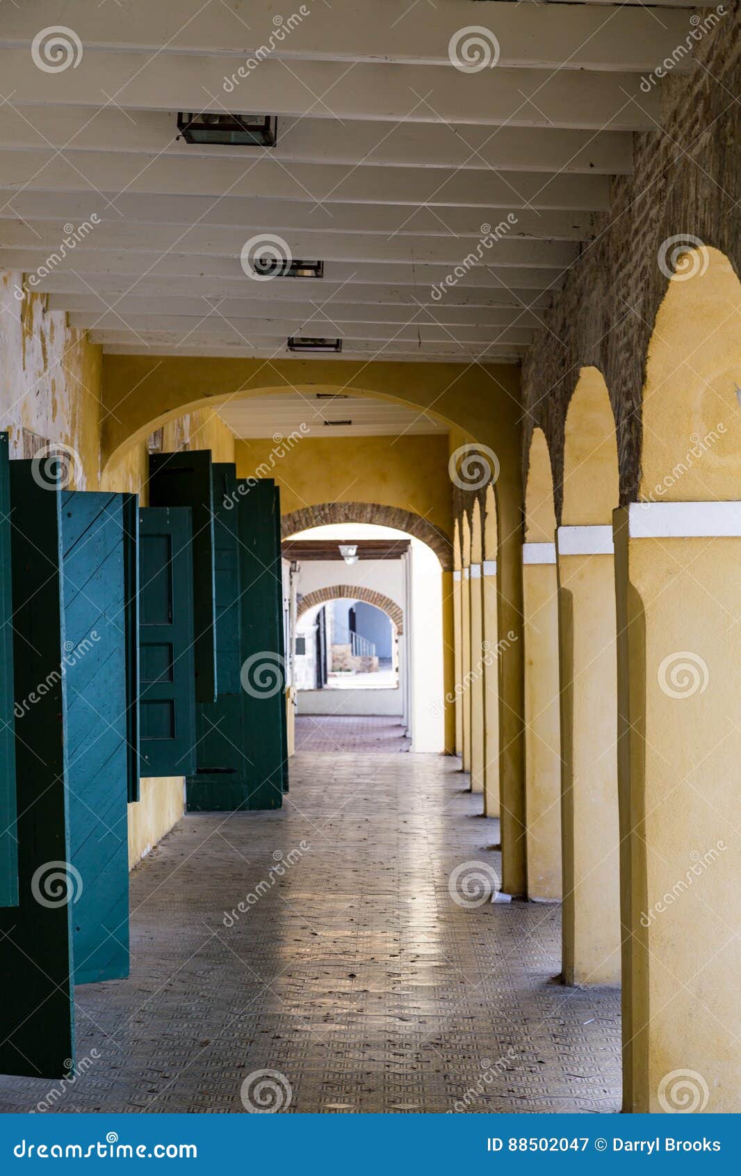 Yellow Columns and Blue Doors Stock Image - Image of arch, vacation ...