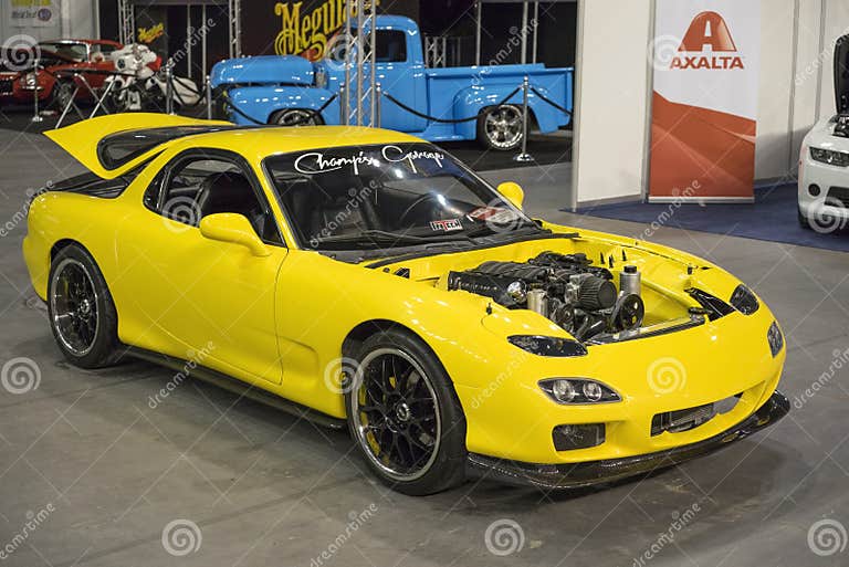 Yellow compact car editorial stock photo. Image of machines - 92365498