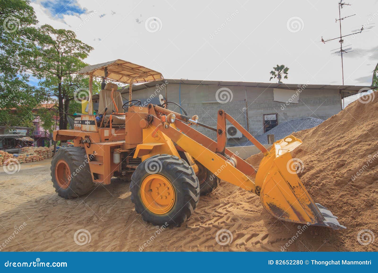 Yellow Construct Tractor Vintage Stock Photo - Image of food, garbage ...
