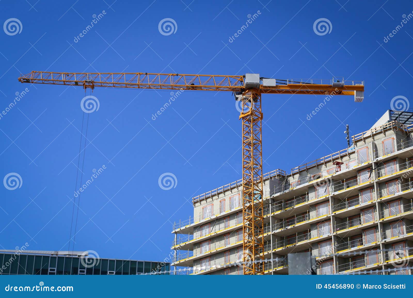Yellow construction crane stock photo. Image of hydraulics - 45456890
