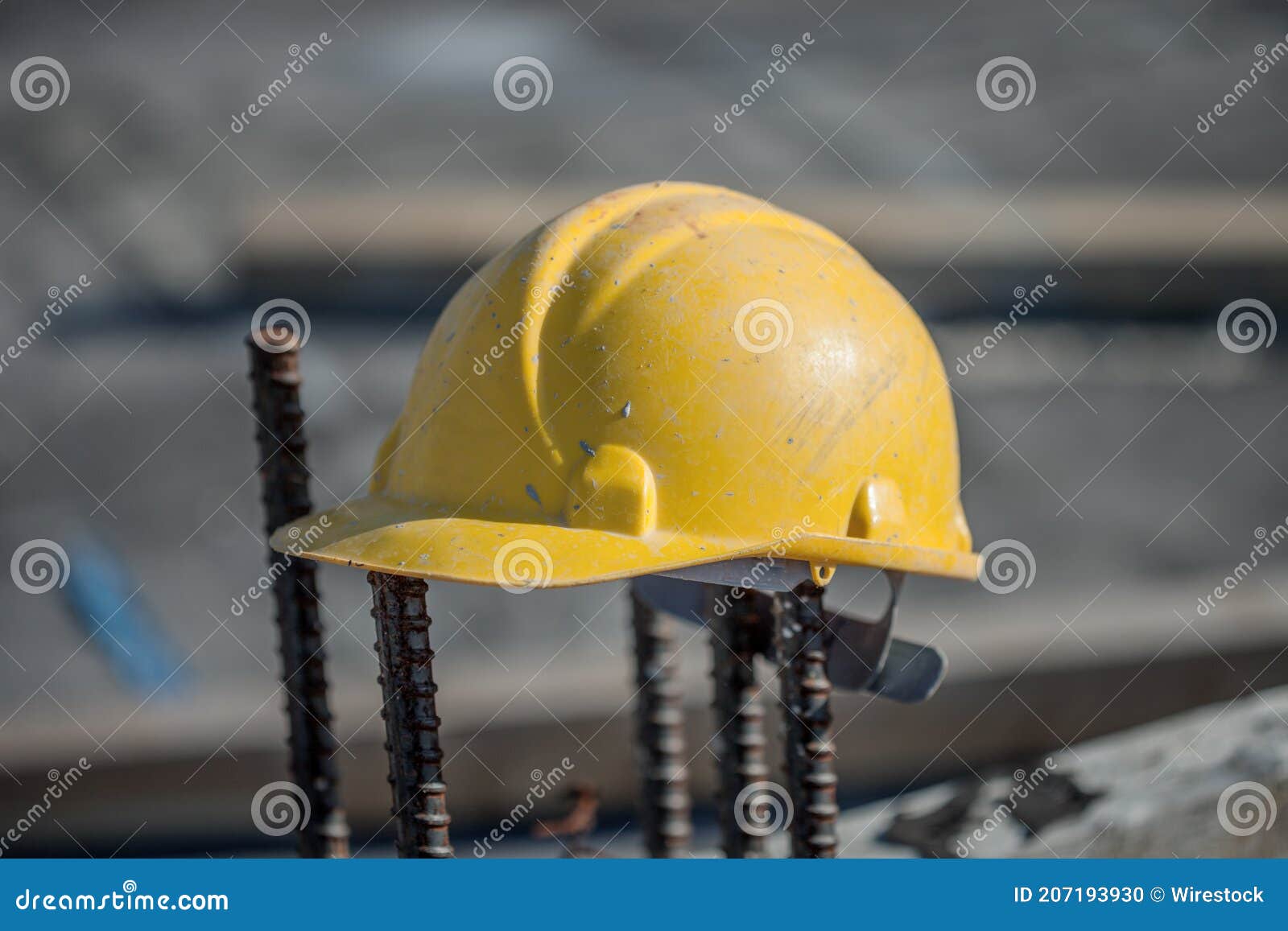 Yellow Construction Safety Helmet at a Construction Site Stock Photo ...
