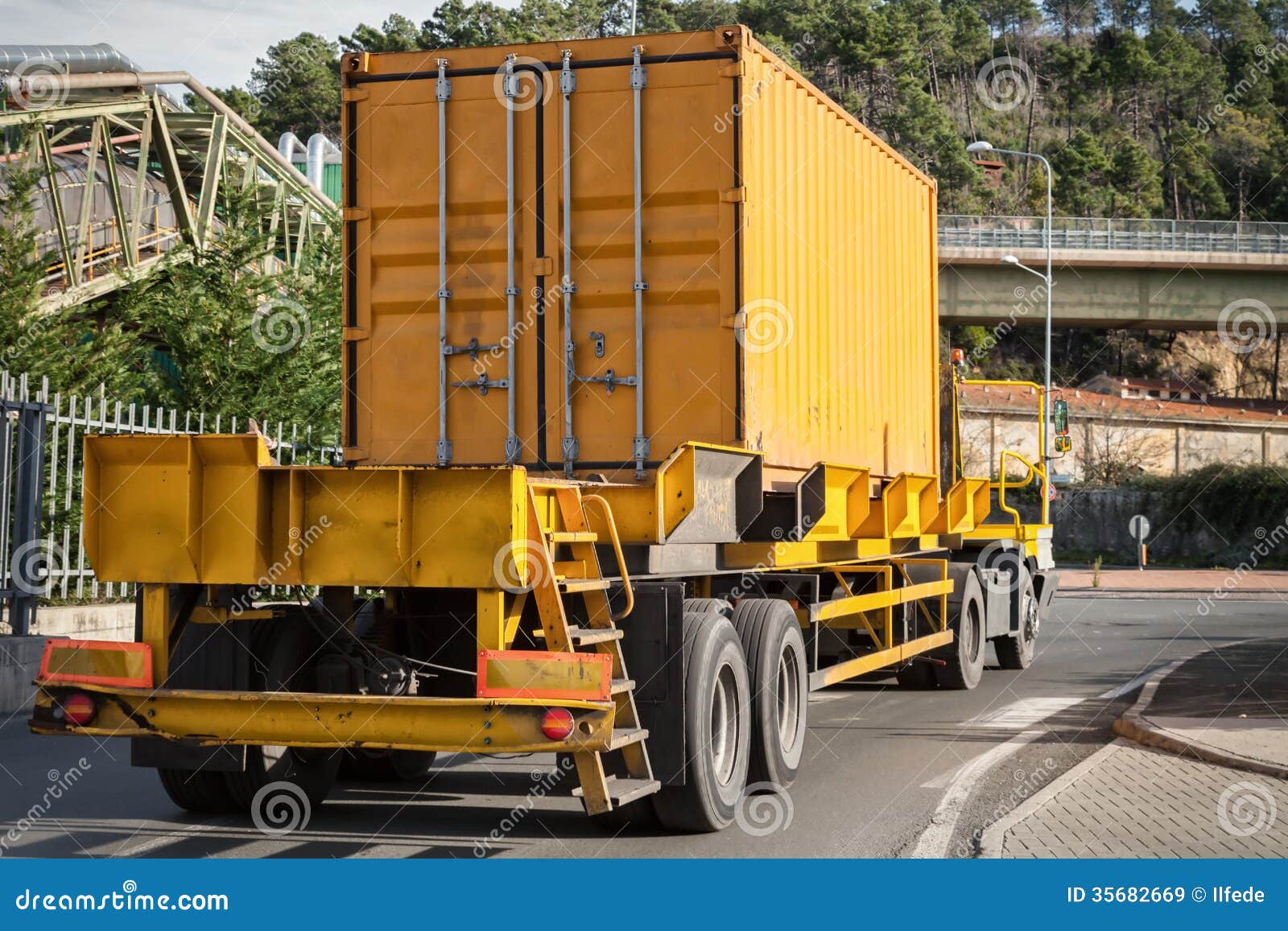 Yellow container on truck stock image. Image of delivery - 35682669