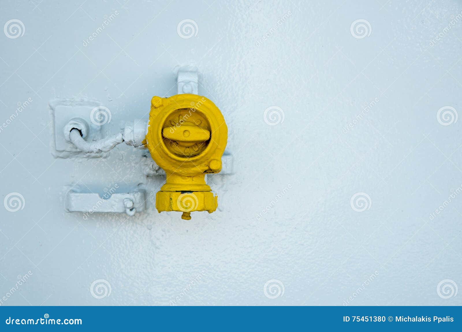 Yellow Control Industrial Switch on a White Metallic Surface Stock ...