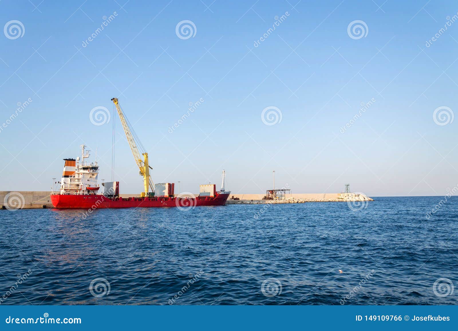Large Freighter In The Ocean And Blue Sky. Empty Freighter. Water ...
