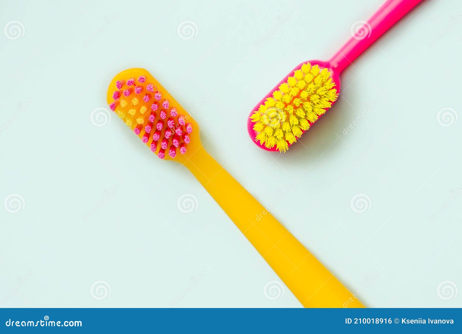 Yellow Creative Toothbrush on Blue Background Stock Photo - Image of ...