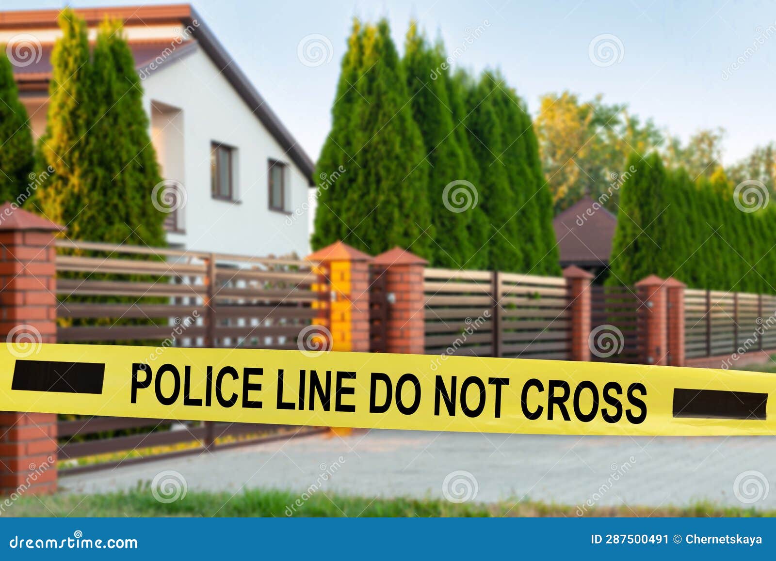 Yellow Crime Scene Tape Blocking Way To House Outdoors Stock Image ...