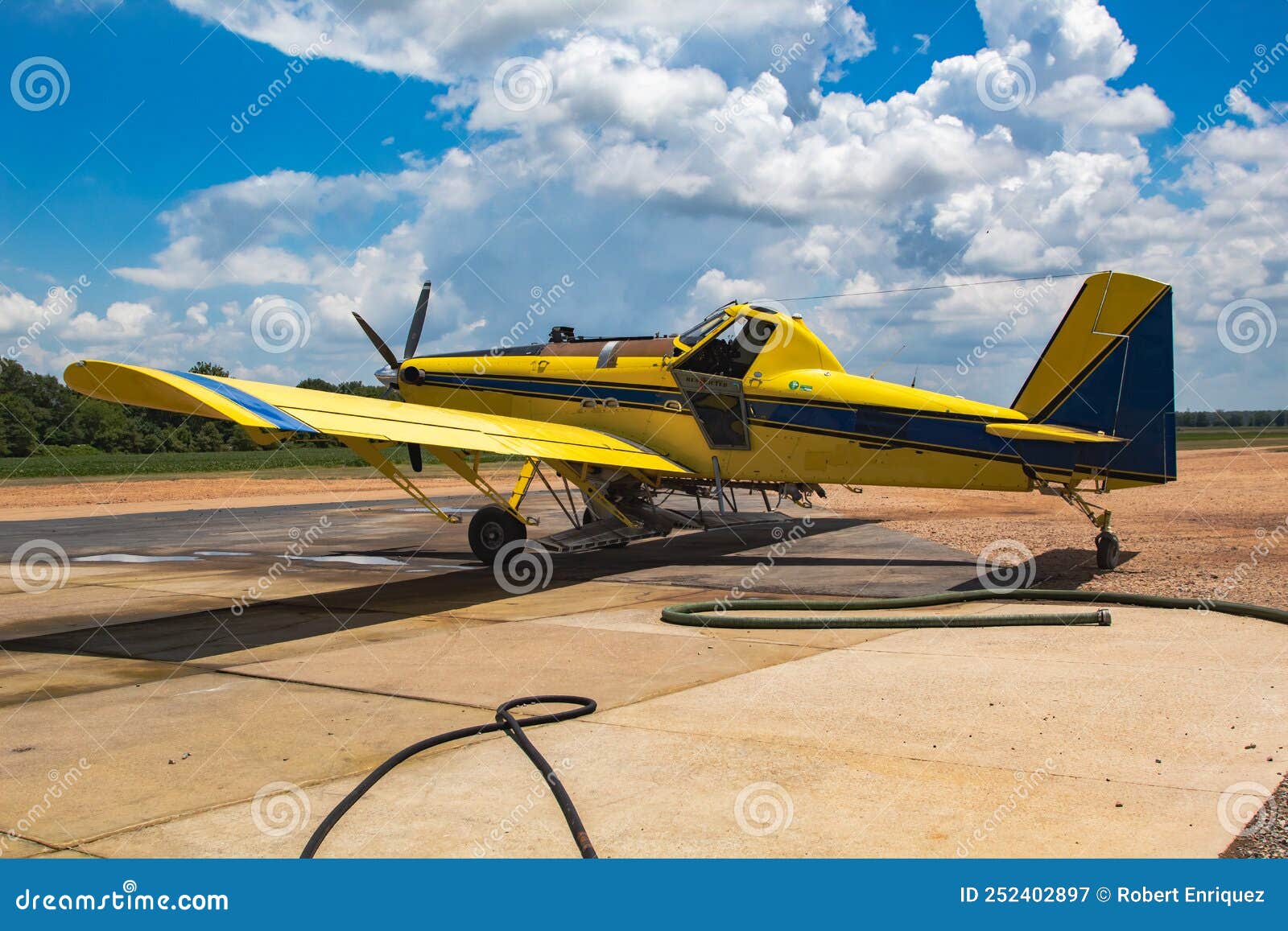 A yellow crop duster plane stock image. Image of industry - 252402897