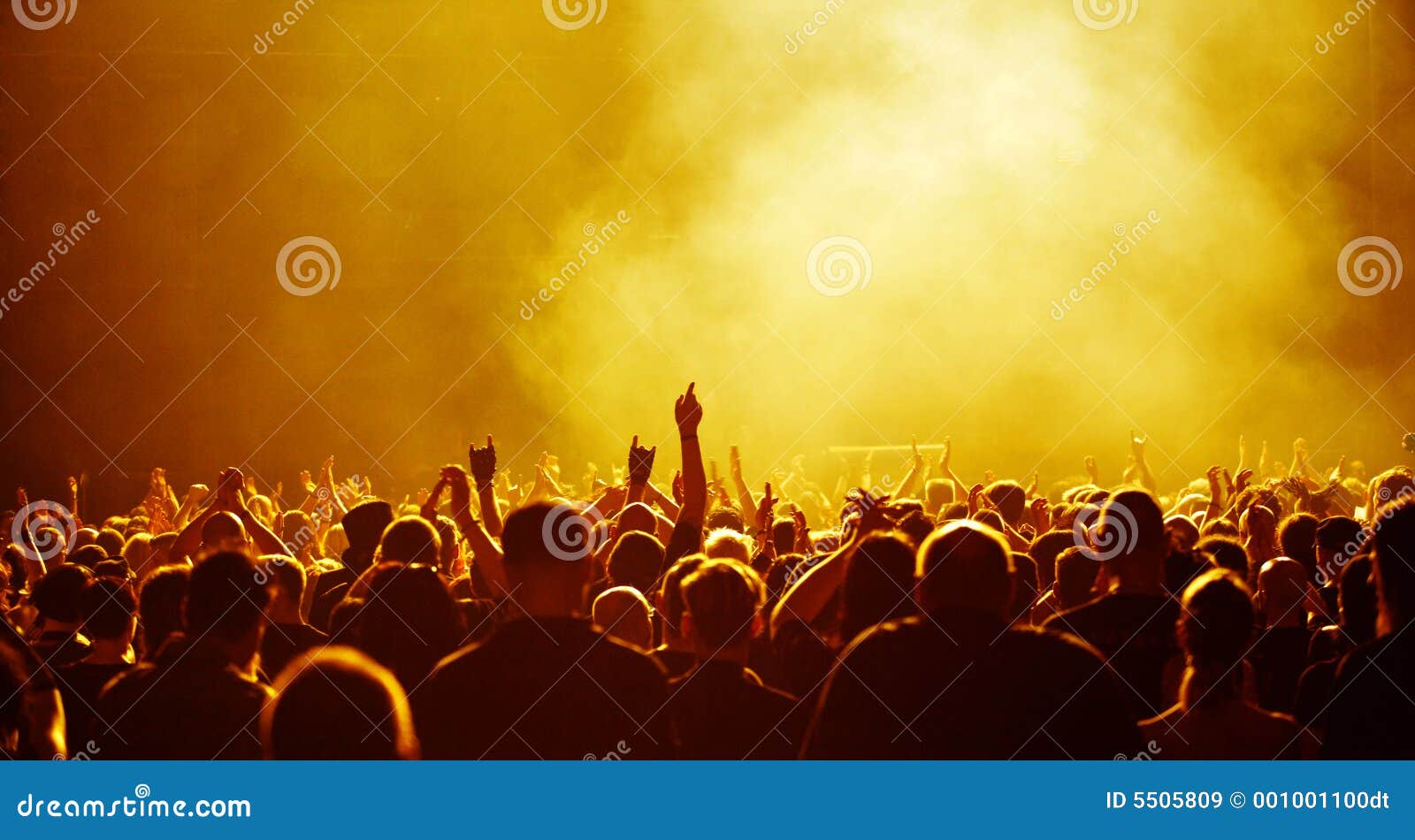 Yellow crowd at concert stock image. Image of arms, encore - 5505809
