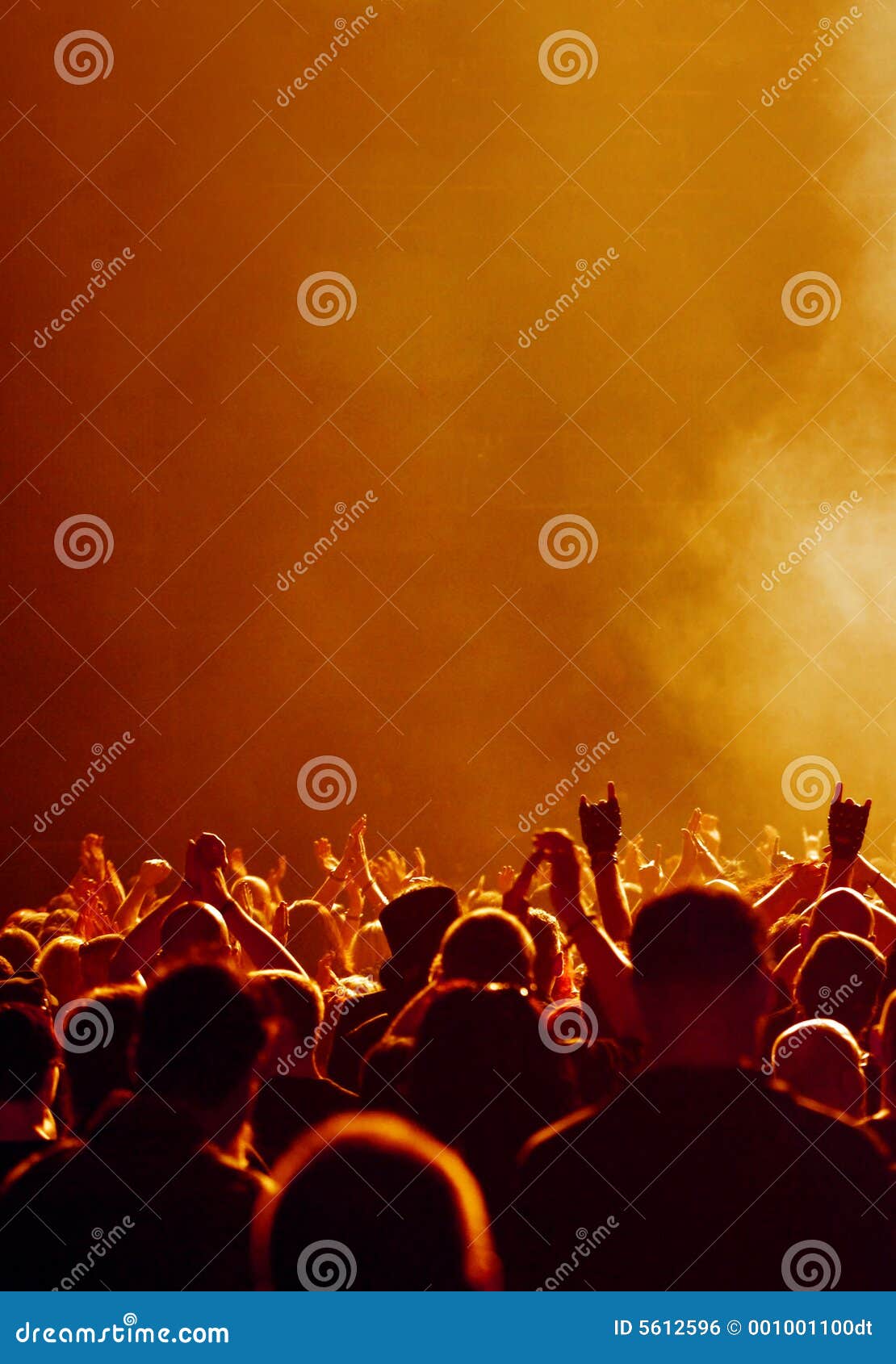 Yellow crowd at concert stock photo. Image of light, cheerful - 5612596