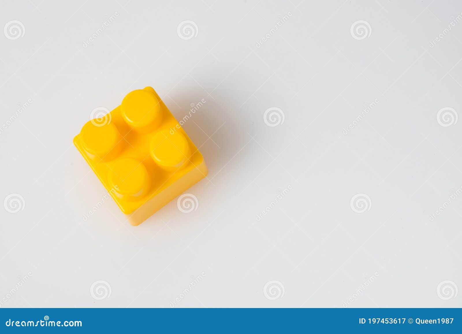 Yellow Cube Block Constructor on a White Background with Copy Space ...