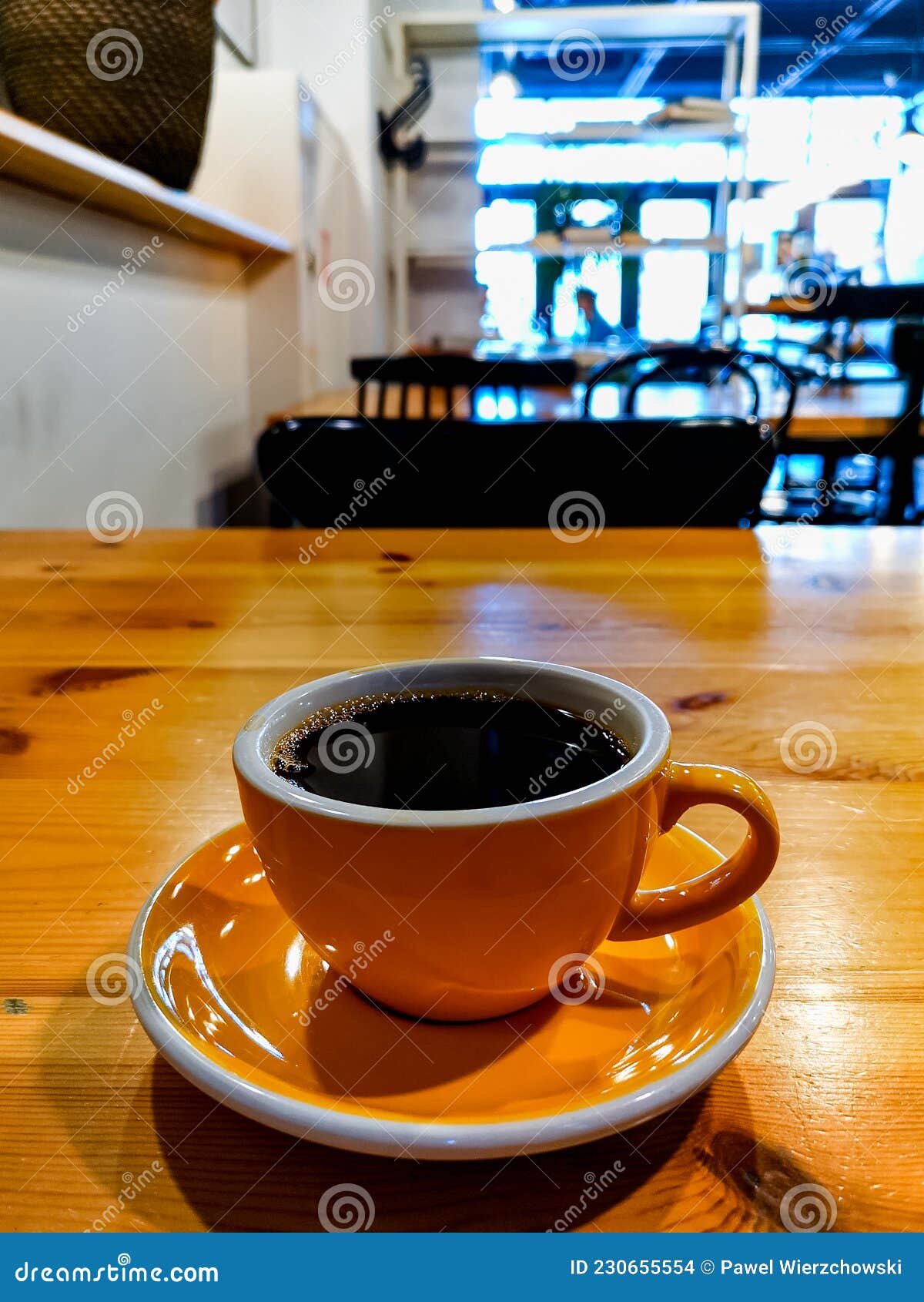 Yellow Cup of Black Overflow Coffee in Small Cafe Stock Photo - Image ...