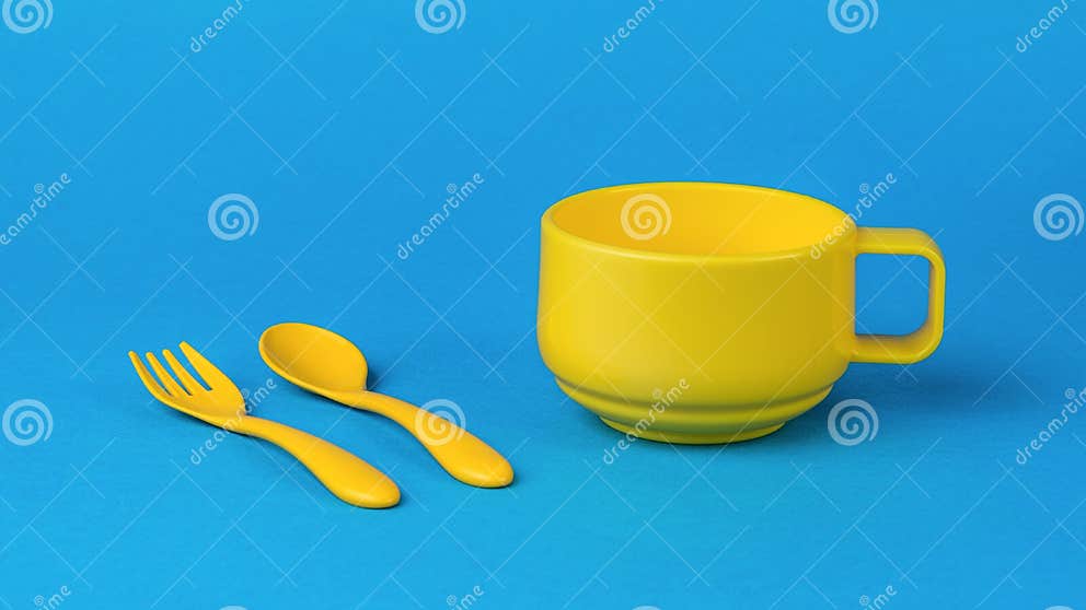 A Yellow Cup with a Handle and a Yellow Fork and Spoon on a Blue ...