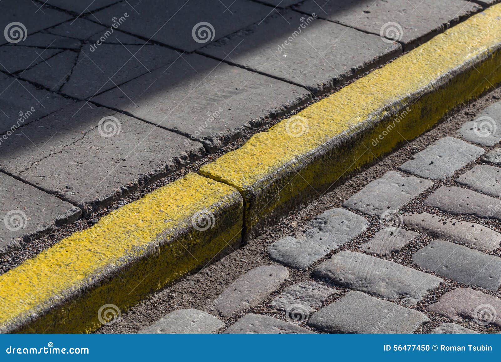 Yellow curb stone border stock photo. Image of rough - 56477450