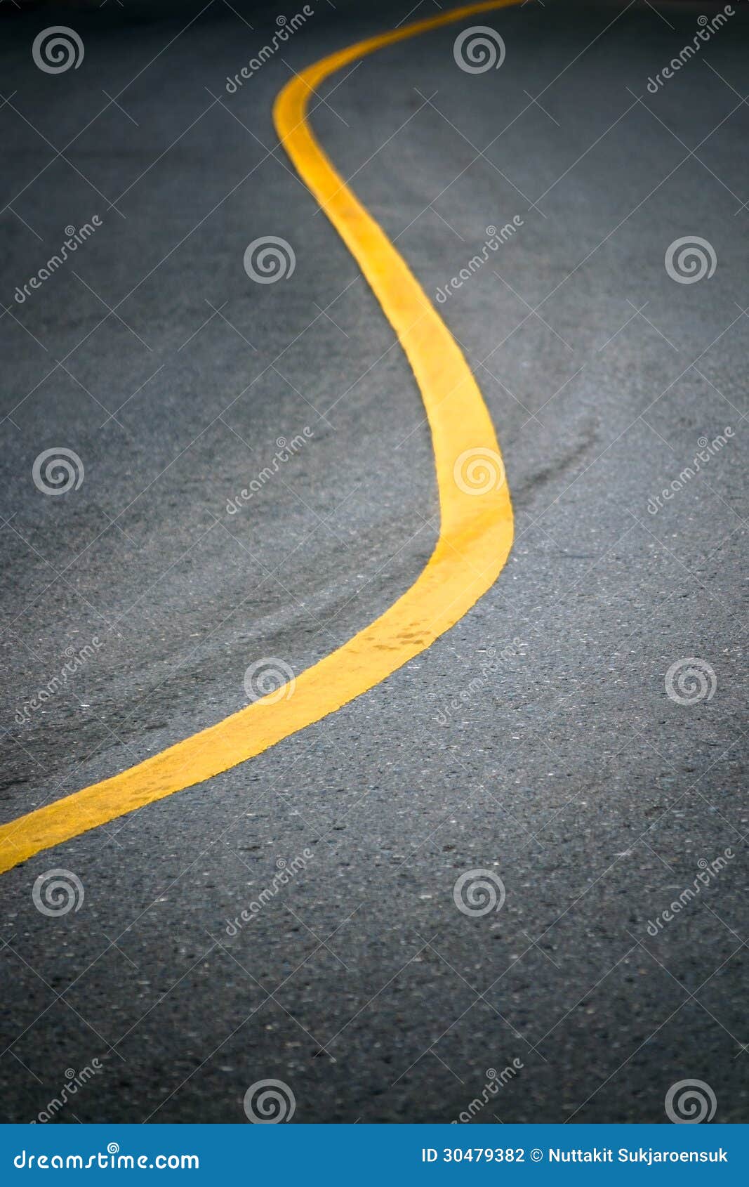 Yellow curve line on road stock photo. Image of black - 30479382