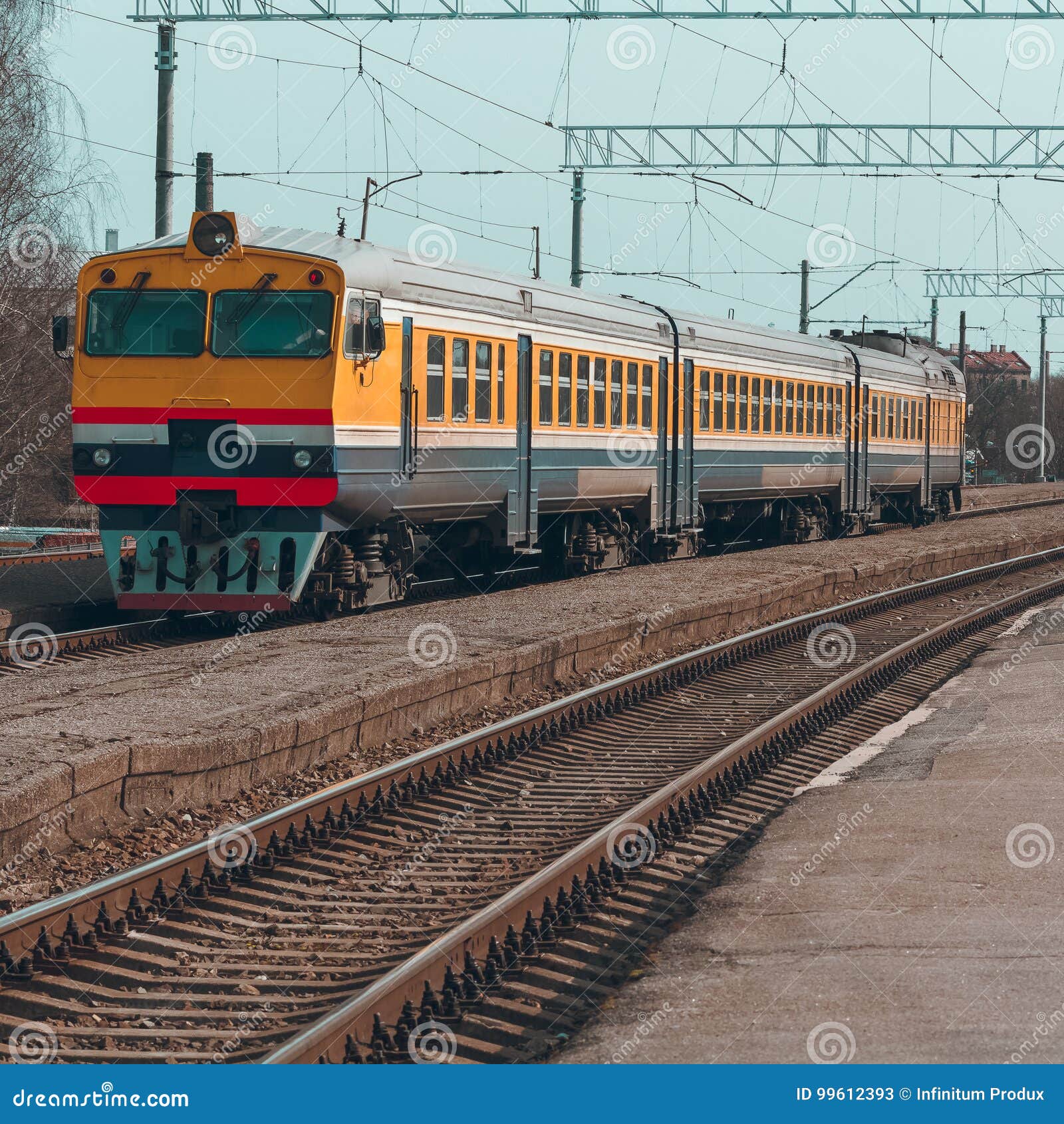 Yellow diesel train stock image. Image of ride, blue - 99612393