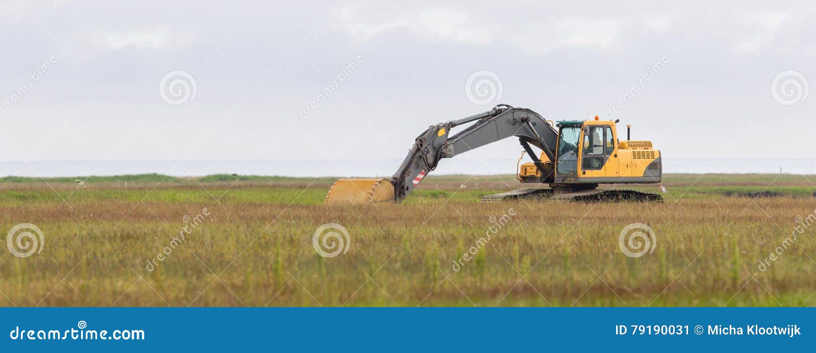 Yellow digger working stock image. Image of machine, development - 79190031