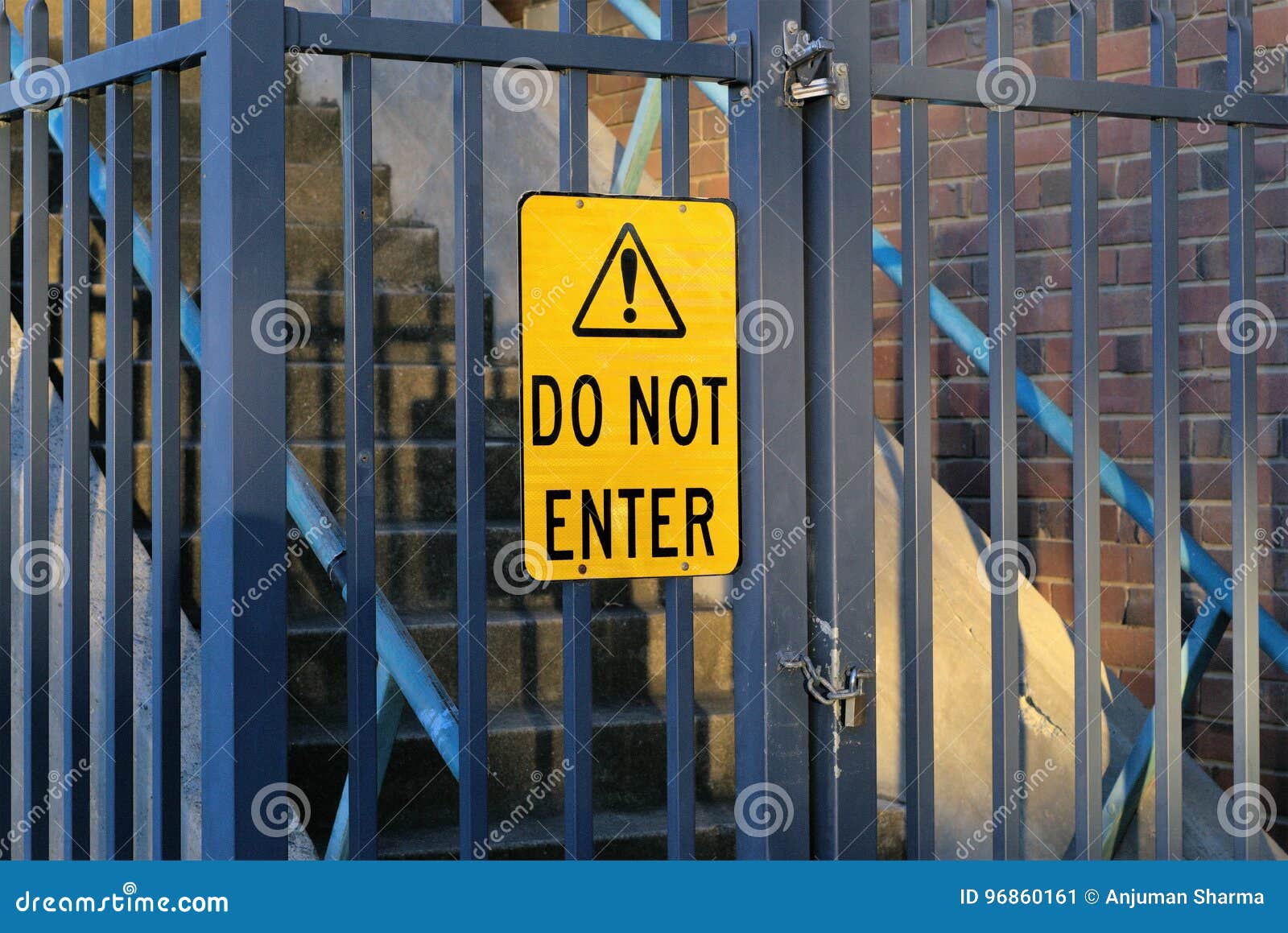 Yellow Do Not Enter Sign on a Gate. Stock Image - Image of exclamation ...