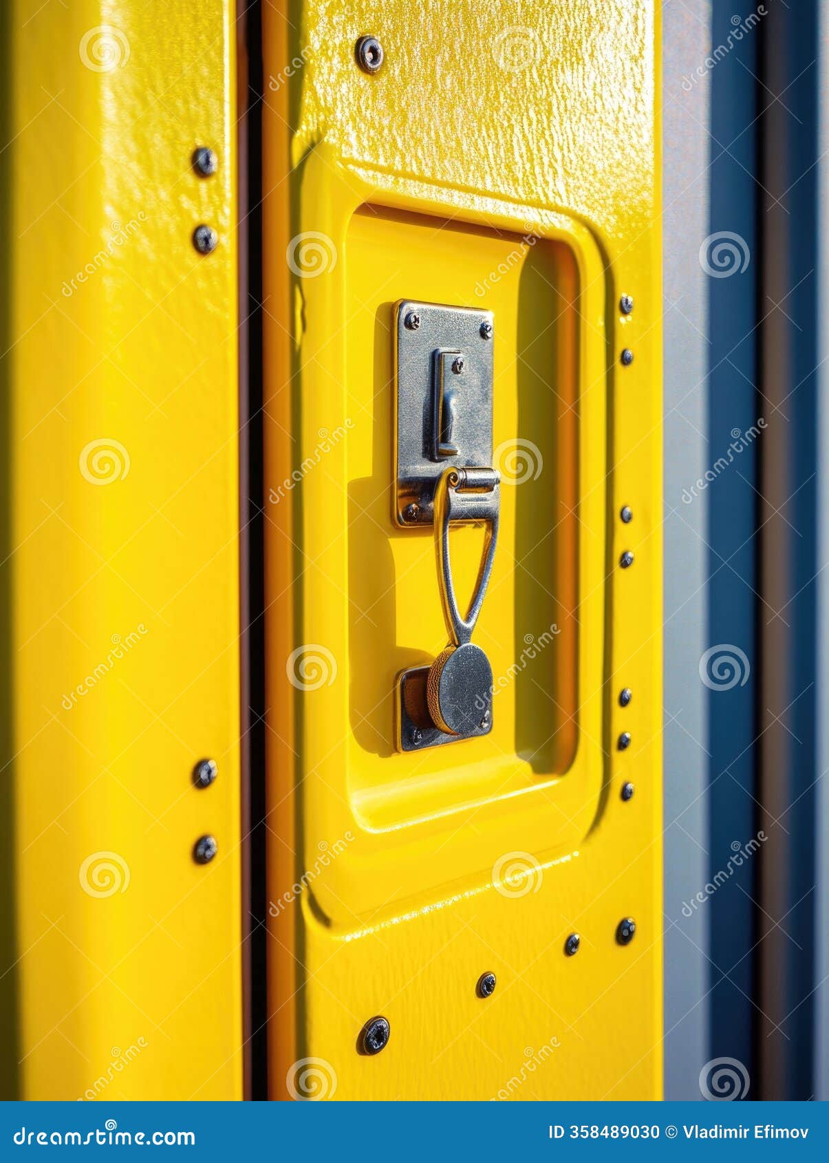 A Yellow Door with a Silver Lock Stock Photo - Image of design, school ...
