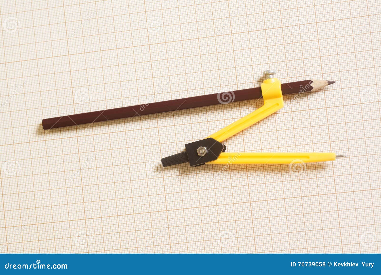Yellow Drawing Compass on Graph Paper Stock Photo - Image of plan, copy ...