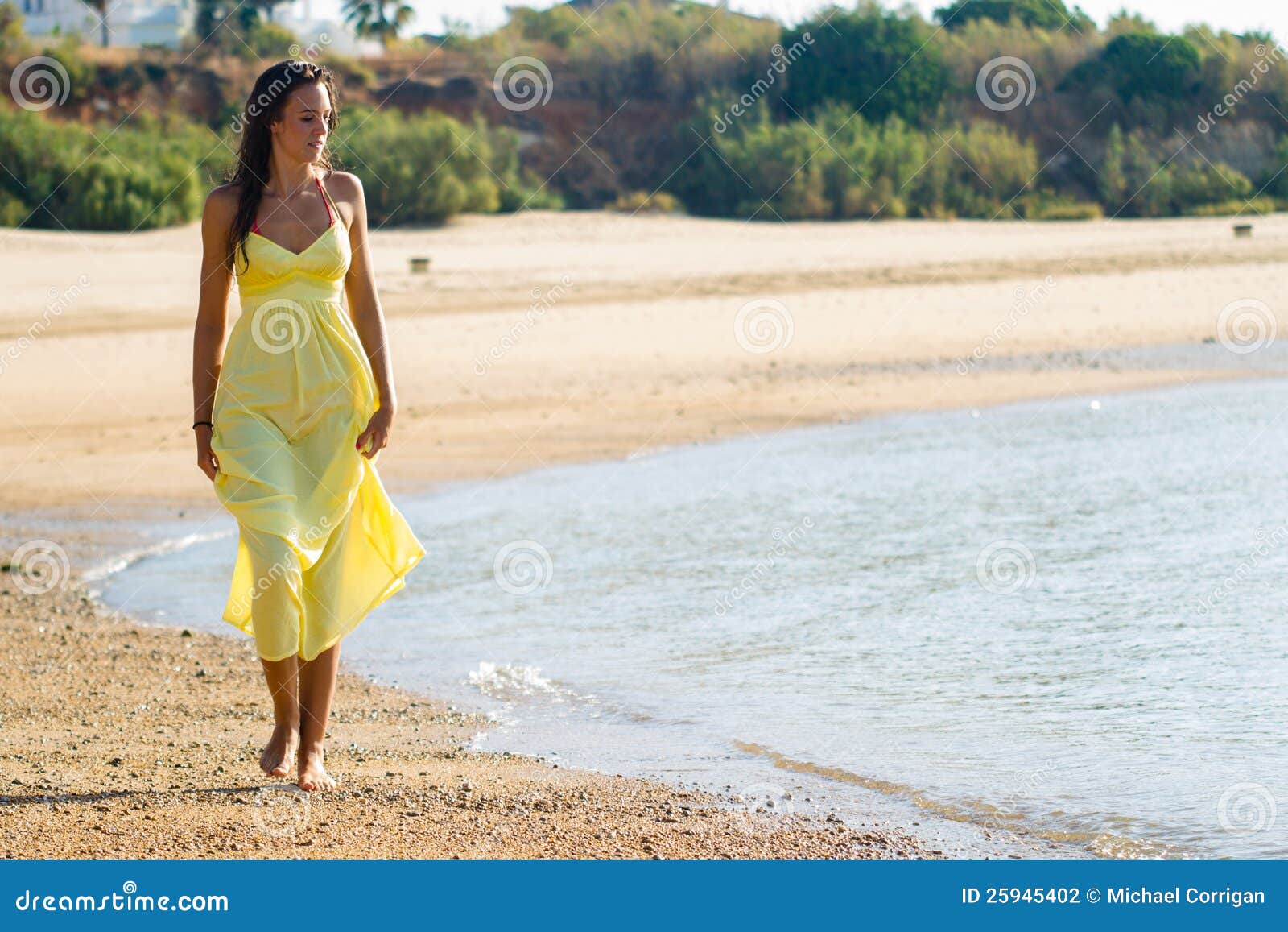 Yellow Dress Stroll on Beach Stock Photo - Image of holiday, thinking ...