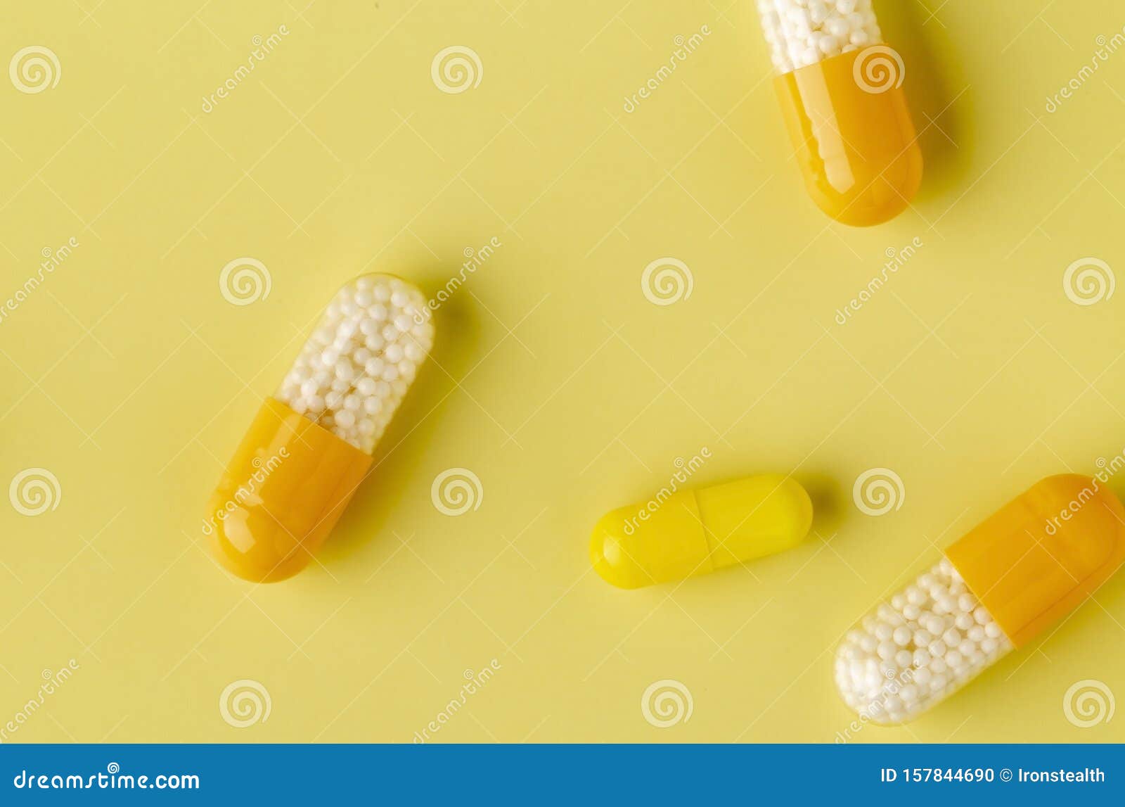 Yellow Drug Soluble Capsules with Microgranules Inside Stock Photo ...