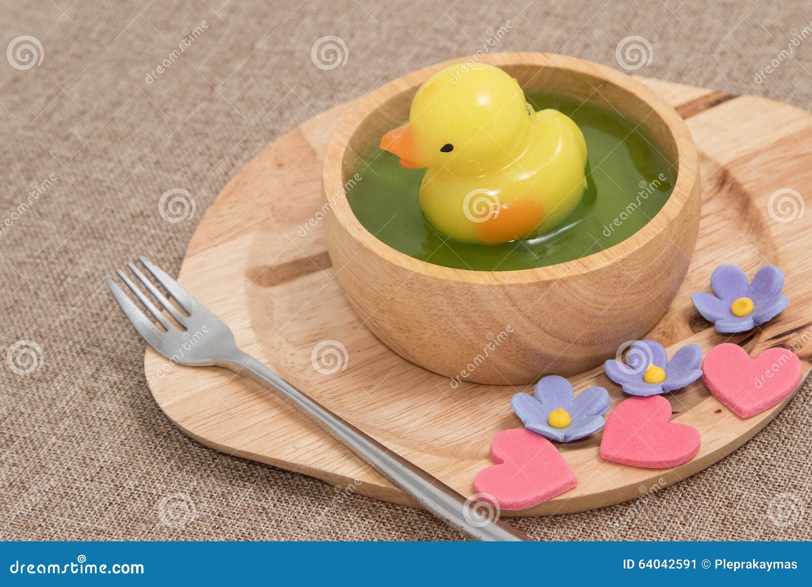 Yellow duck jelly in cup stock image. Image of coconut - 64042591
