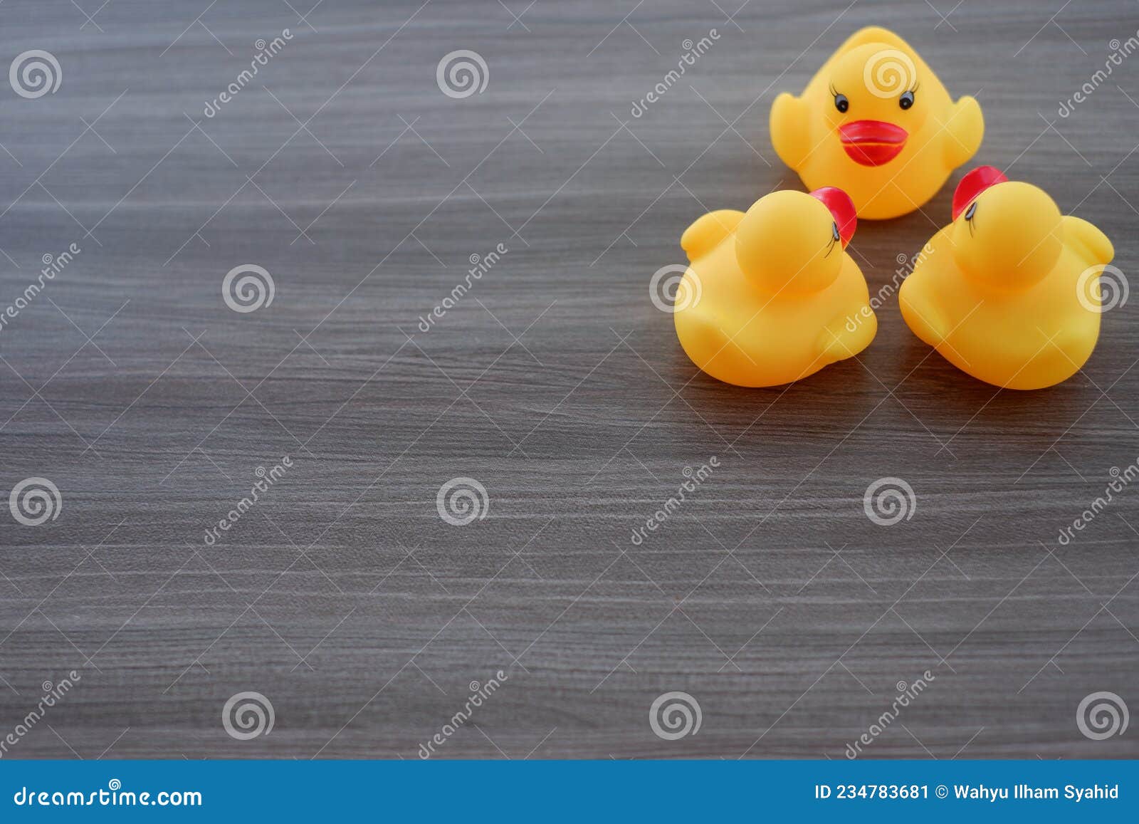 Yellow Duck Toy on a Wooden Texture Background Stock Image - Image of ...