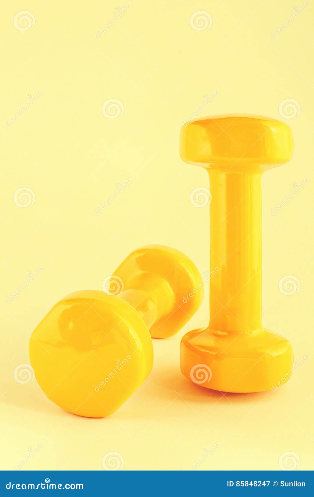 Yellow dumbbells stock image. Image of iron, aerobic - 85848247
