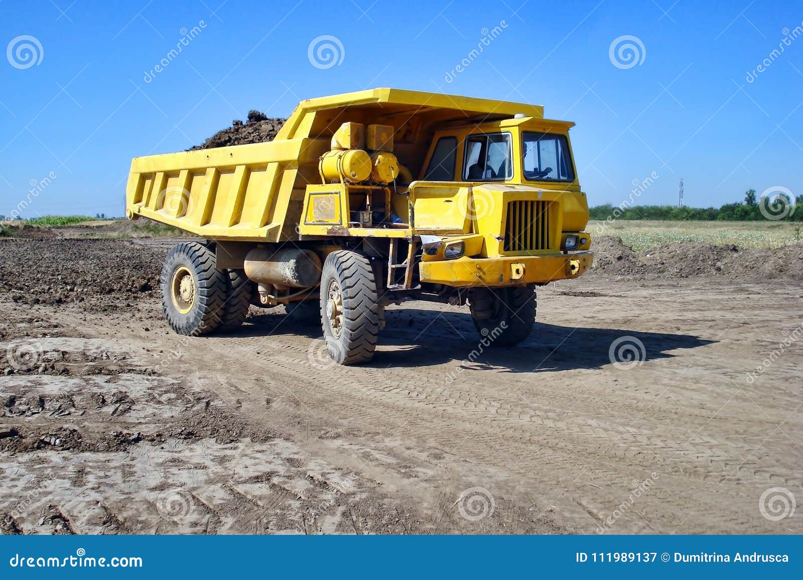Yellow dump truck stock image. Image of heavy, high - 111989137