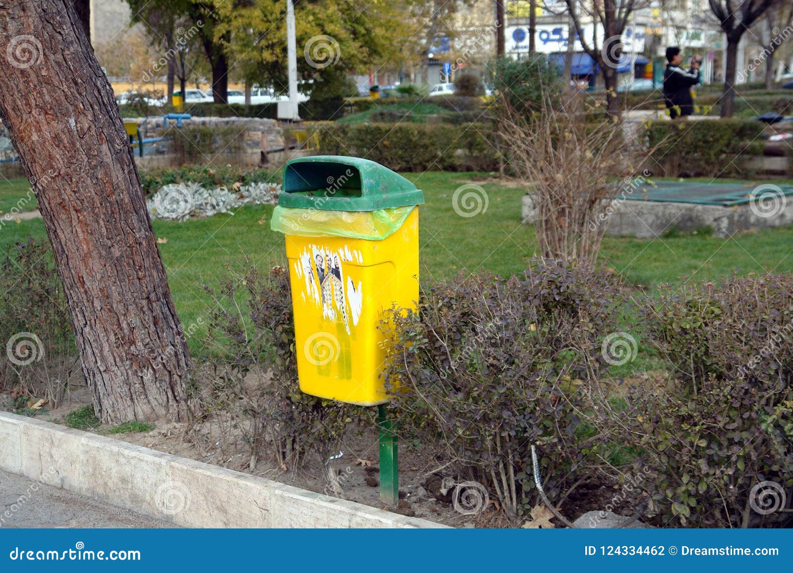 Yellow dustbin in park editorial photography. Image of used - 124334462