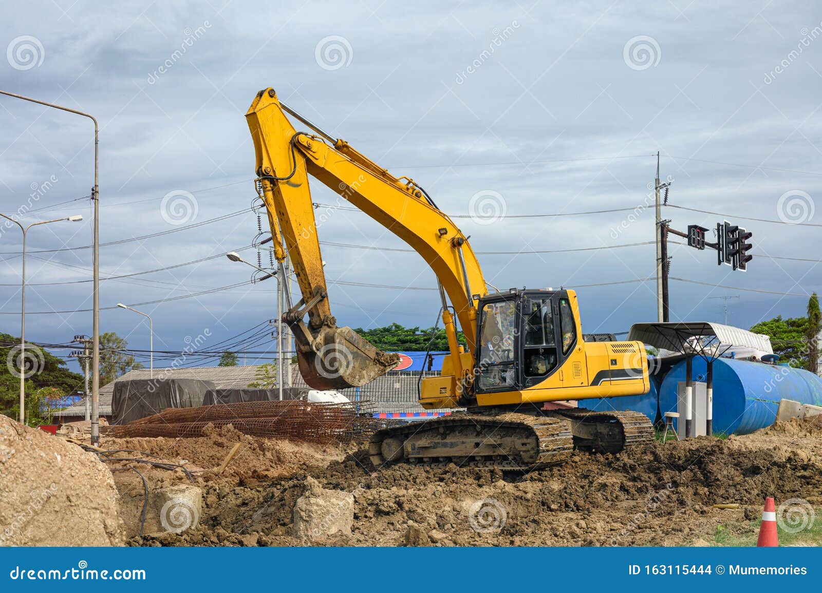 Yellow Earthmover Backhoe on Soil at Construction Site Stock Photo ...