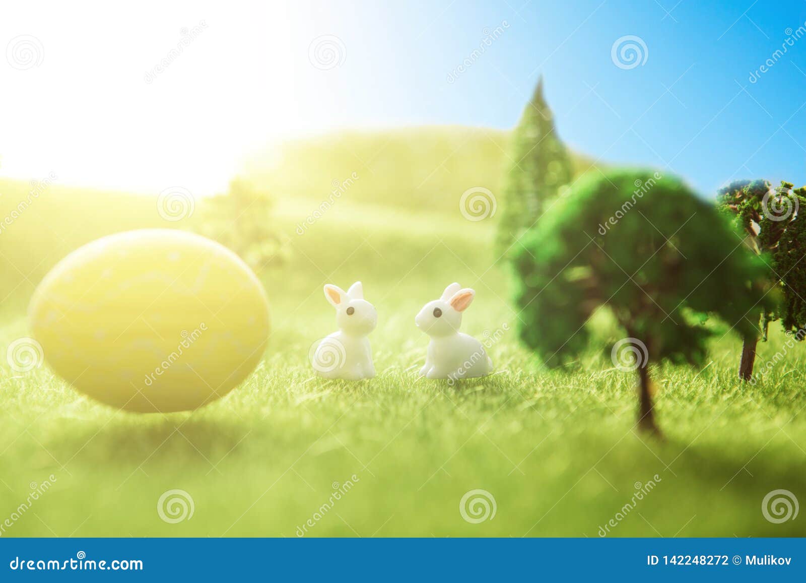 Yellow Easter Egg Spring Meadow with Two White Rabbit and Easter Eggs ...