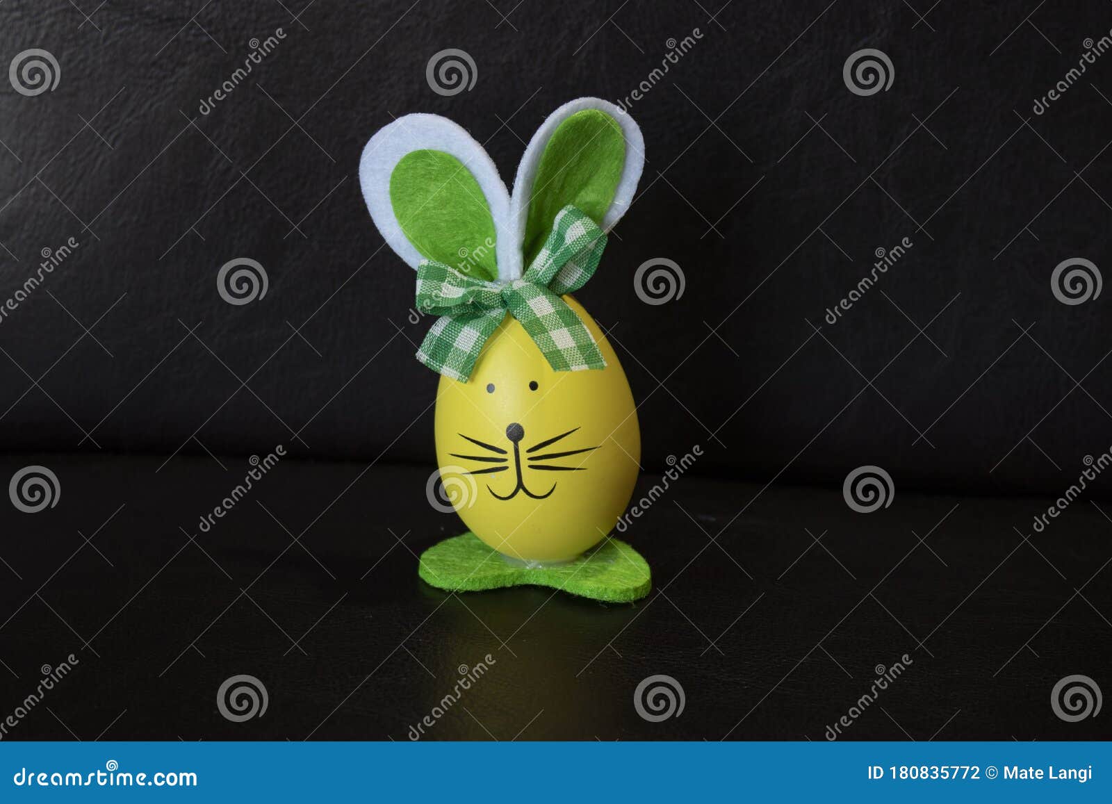 Yellow Easter Rabbit Figure Made of Plastic Egg, before Dark Background ...