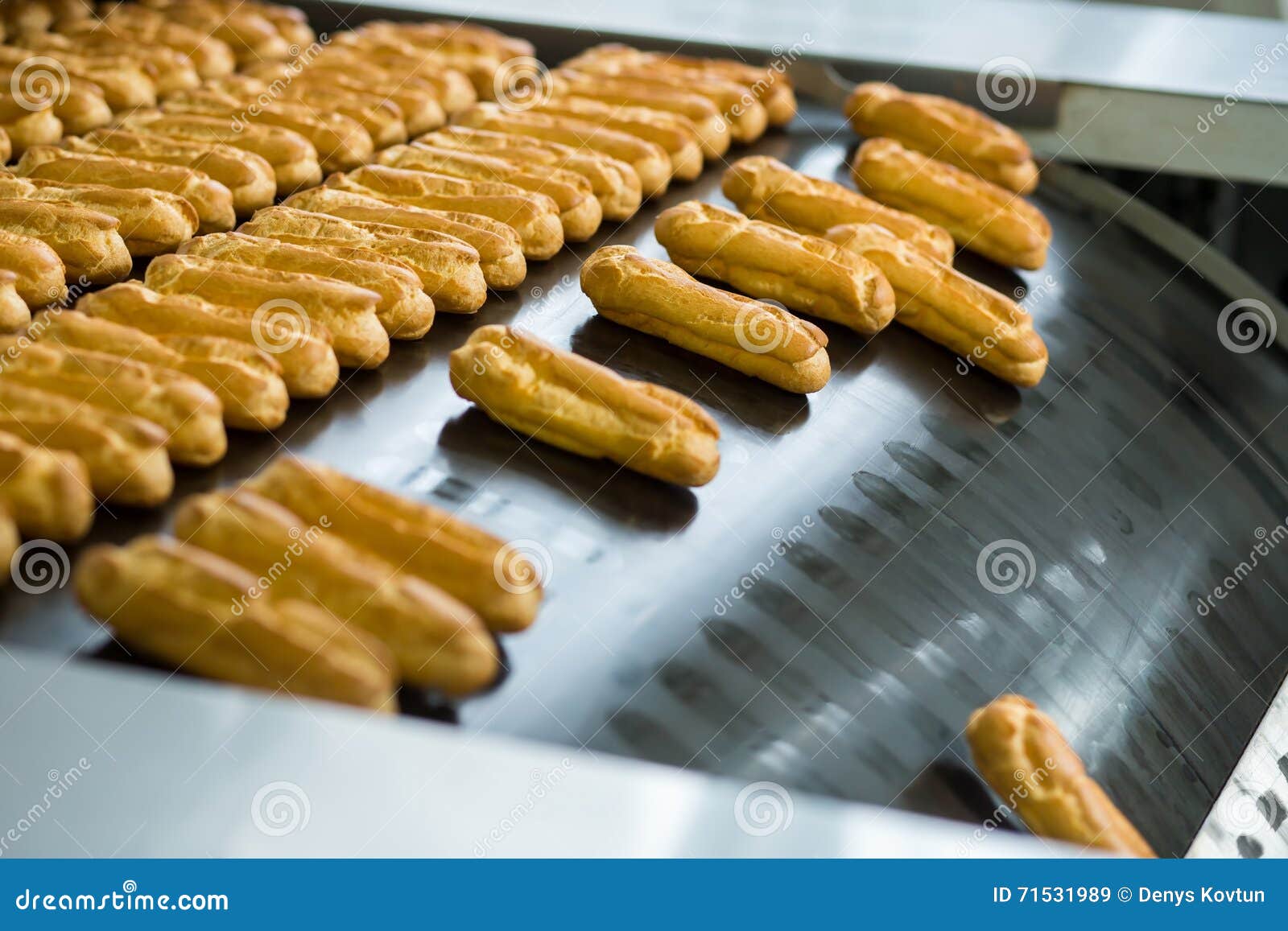Yellow Eclair Shells on Conveyor. Stock Image - Image of recipe ...