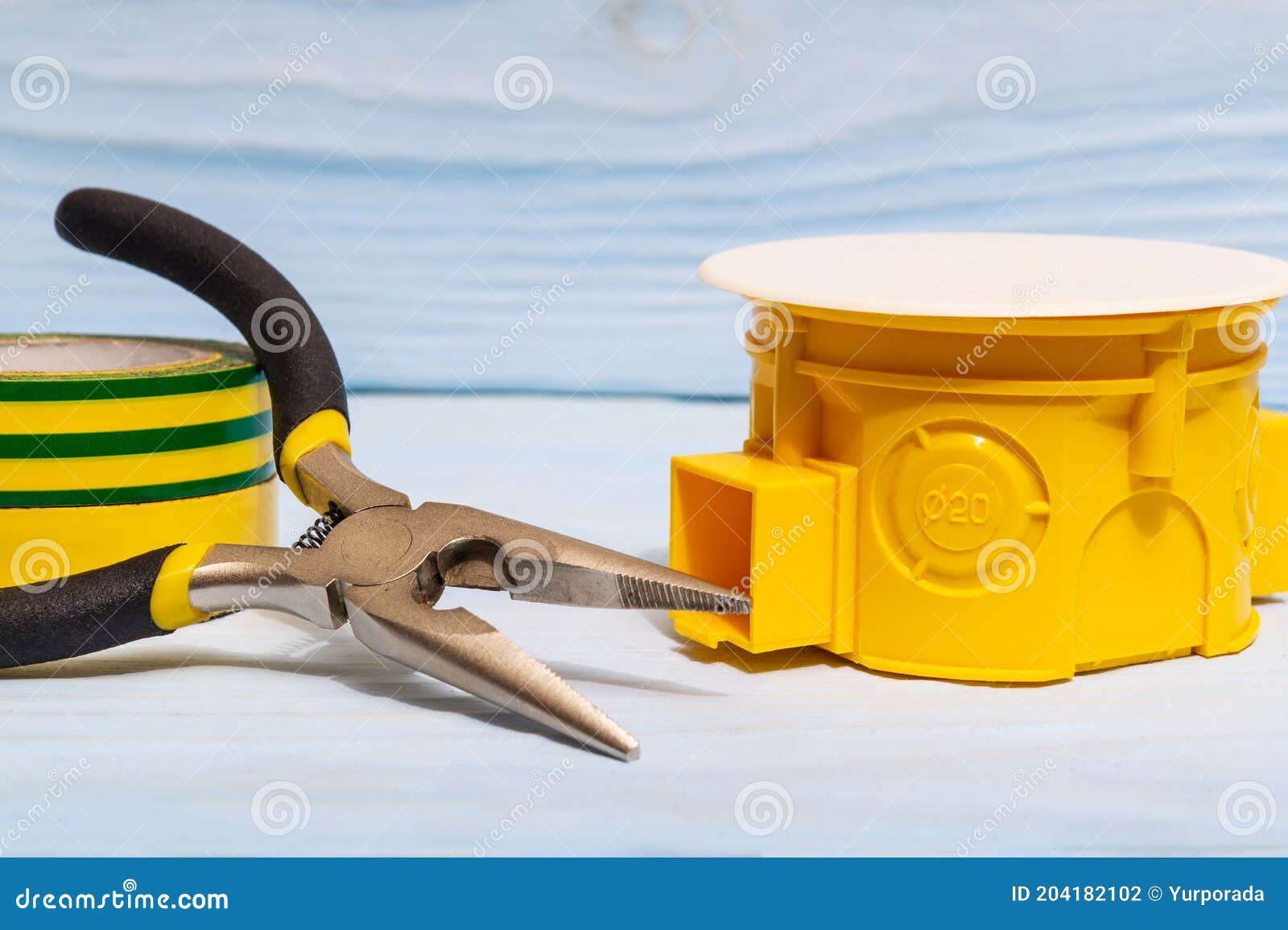 Yellow Electrical Junction Box and Tool Usually Used in the Electric ...