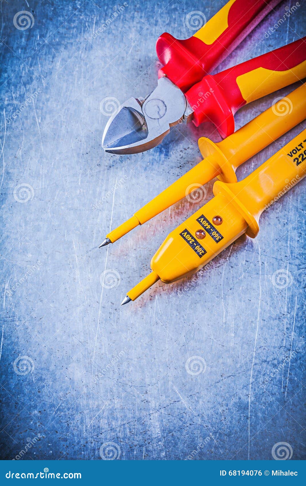 Yellow Electrical Tester Red Sharp Wire Cutter on Metallic Backg Stock ...
