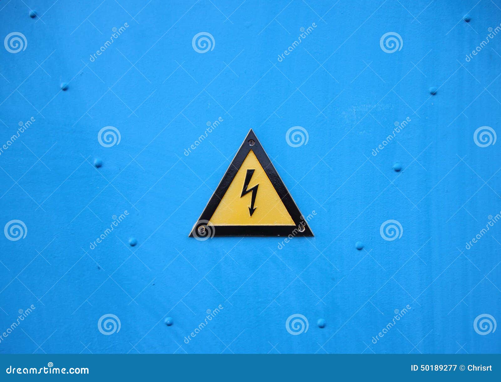 Yellow Electrical Warning Triangle Sign on Blue Background Stock Image ...