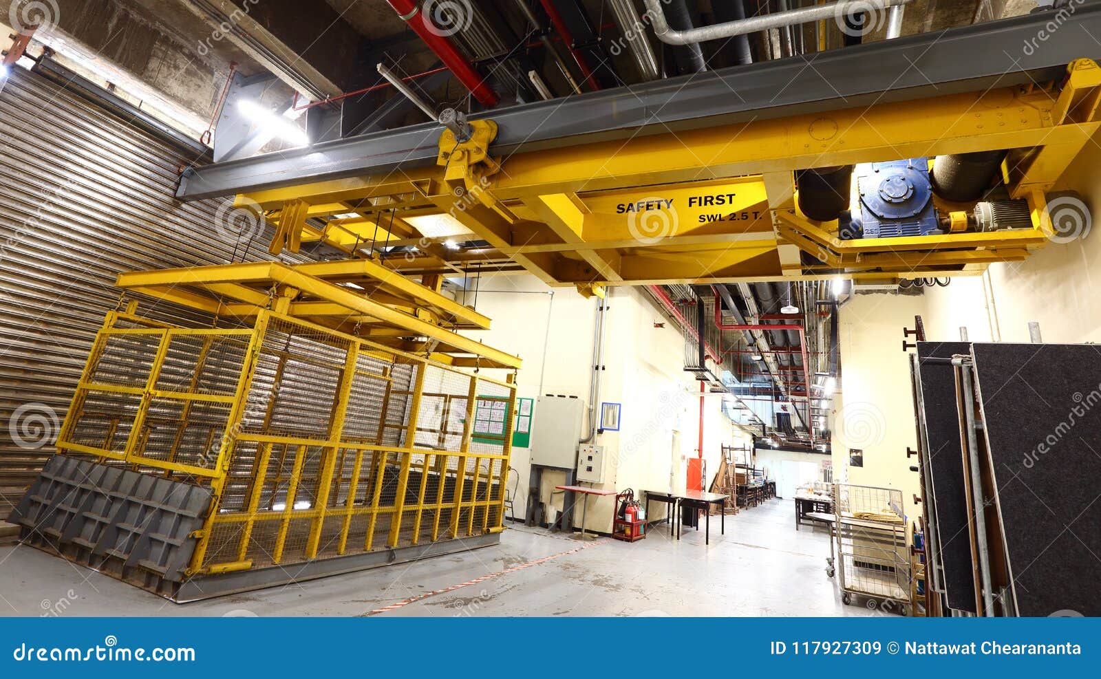Yellow Elevator in Loading Bay To Load Heavy Machine Inside Building ...
