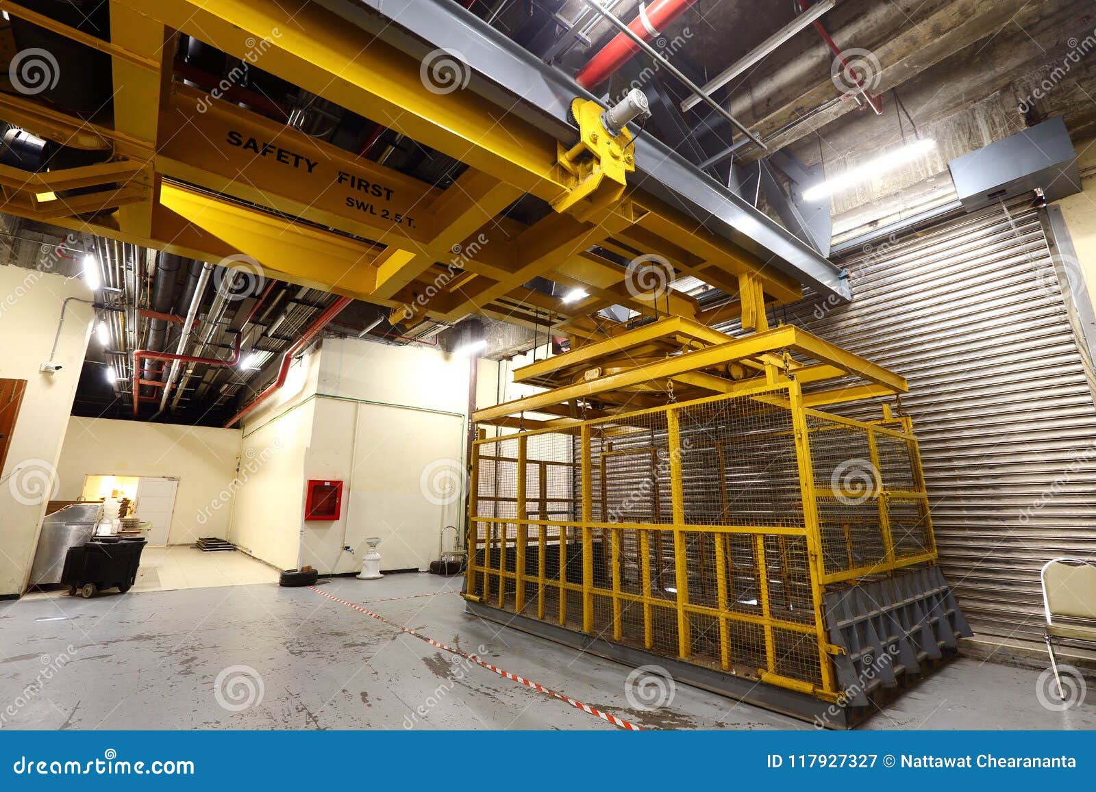 Yellow Elevator in Loading Bay To Load Heavy Machine Inside Building ...