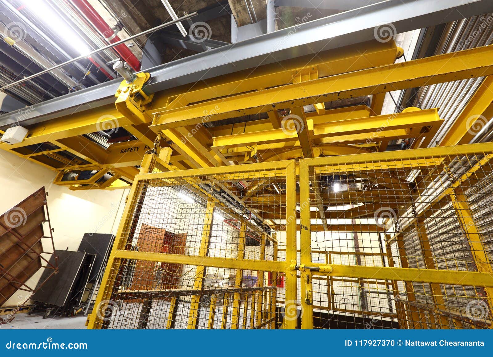 Yellow Elevator in Loading Bay To Load Heavy Machine Inside Building ...