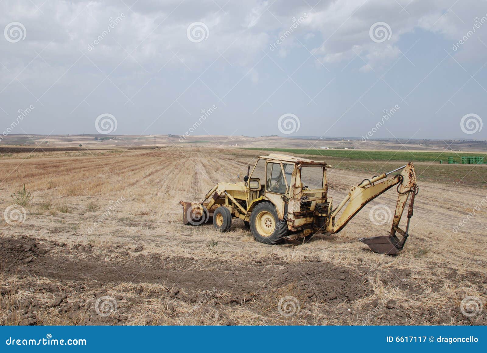 Yellow Engineering Vehicle in Field Stock Image - Image of yellow ...